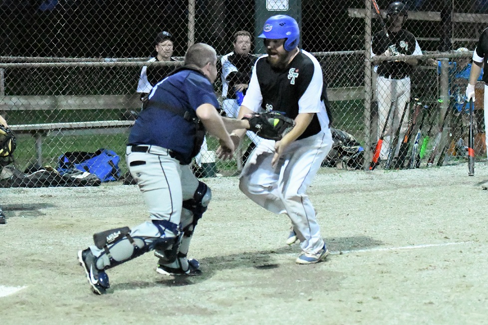 St. Thomas Storm's Randy Gray is tagged by Appin A's catcher Nate ...